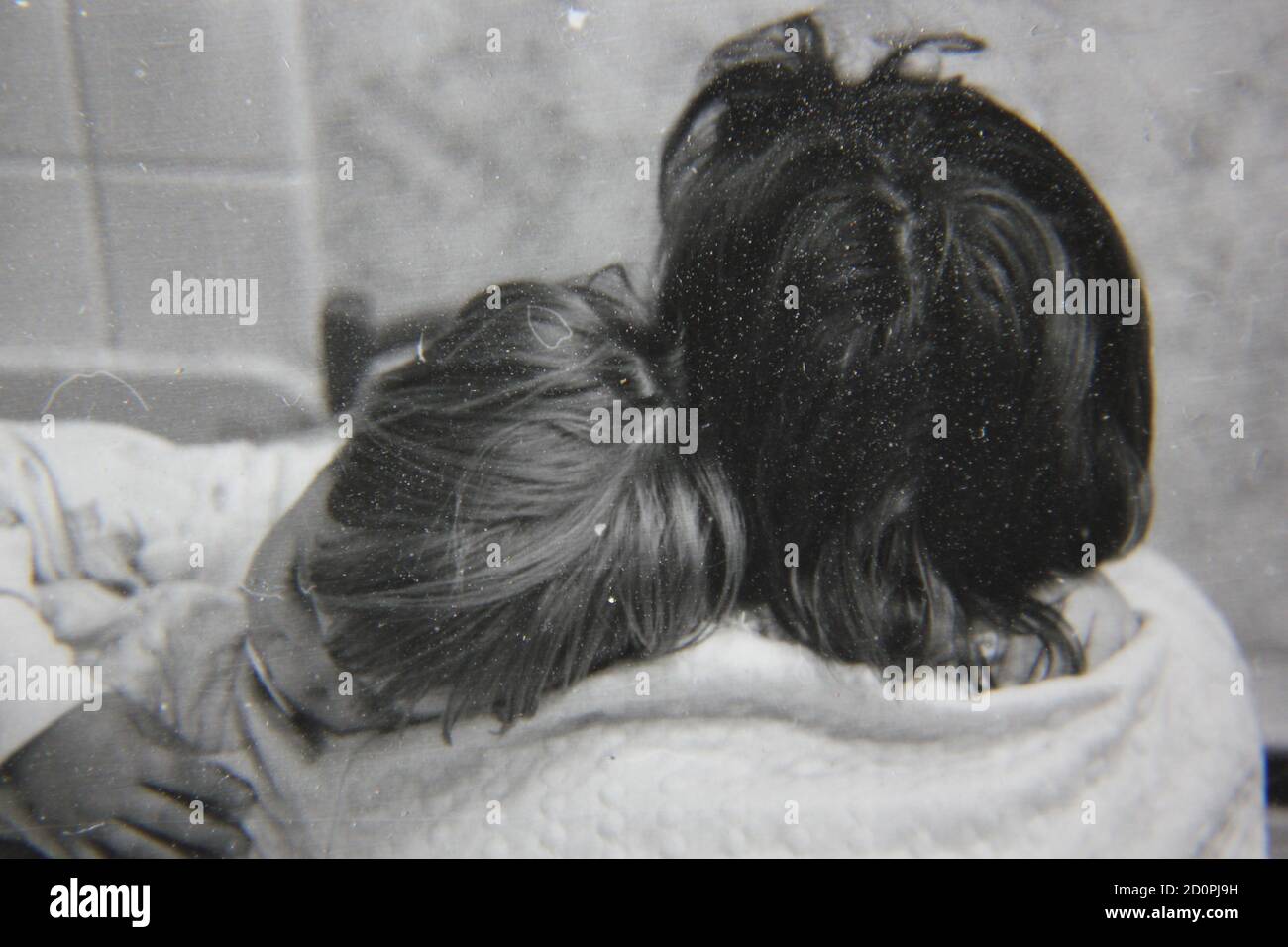 Fine 1970s vintage black and white photography of a mother parenting ...