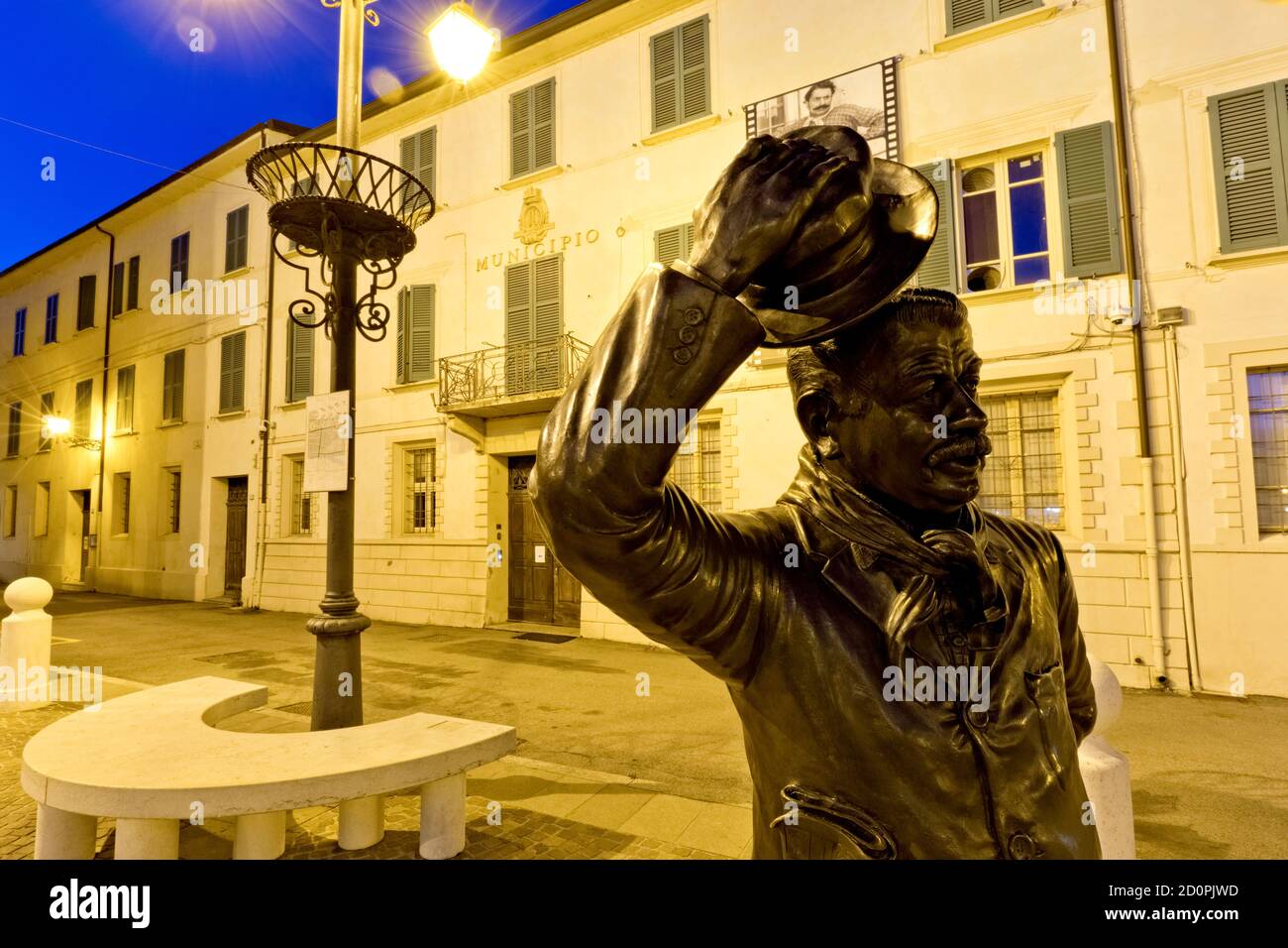 Brescello: the statue of Peppone and the town hall. The village is ...