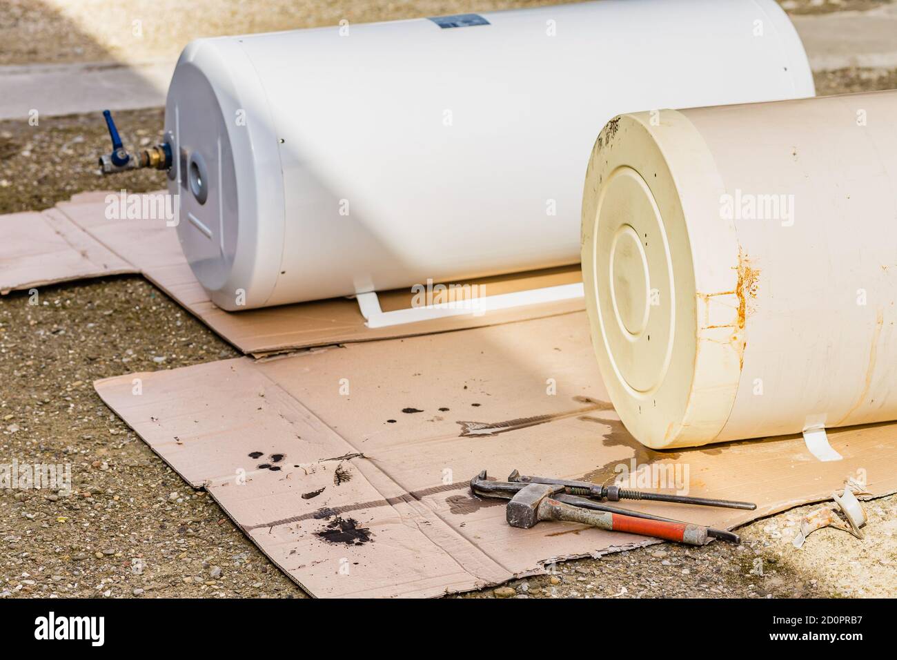 replacement of damaged boiler with a new one Stock Photo - Alamy