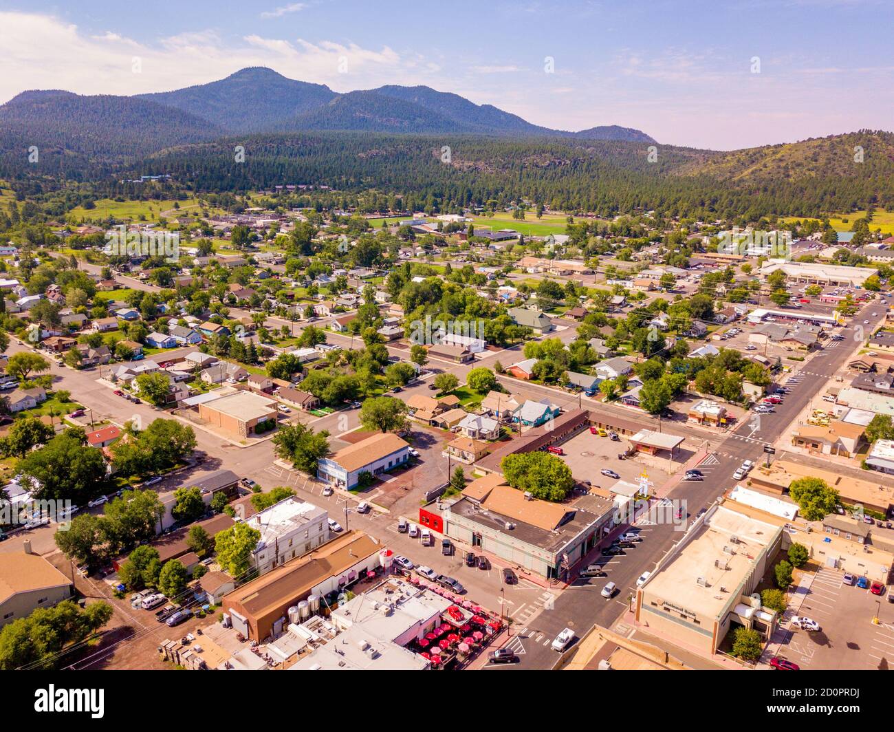Aerial view of the city center in Williams, Arizona with a mountain ...