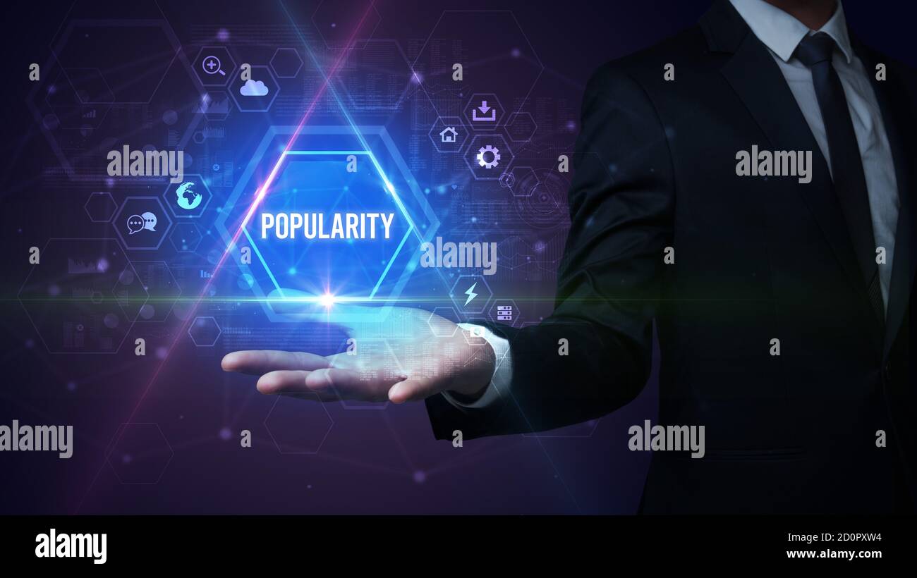 Man hand holding POPULARITY inscription, social media concept Stock ...