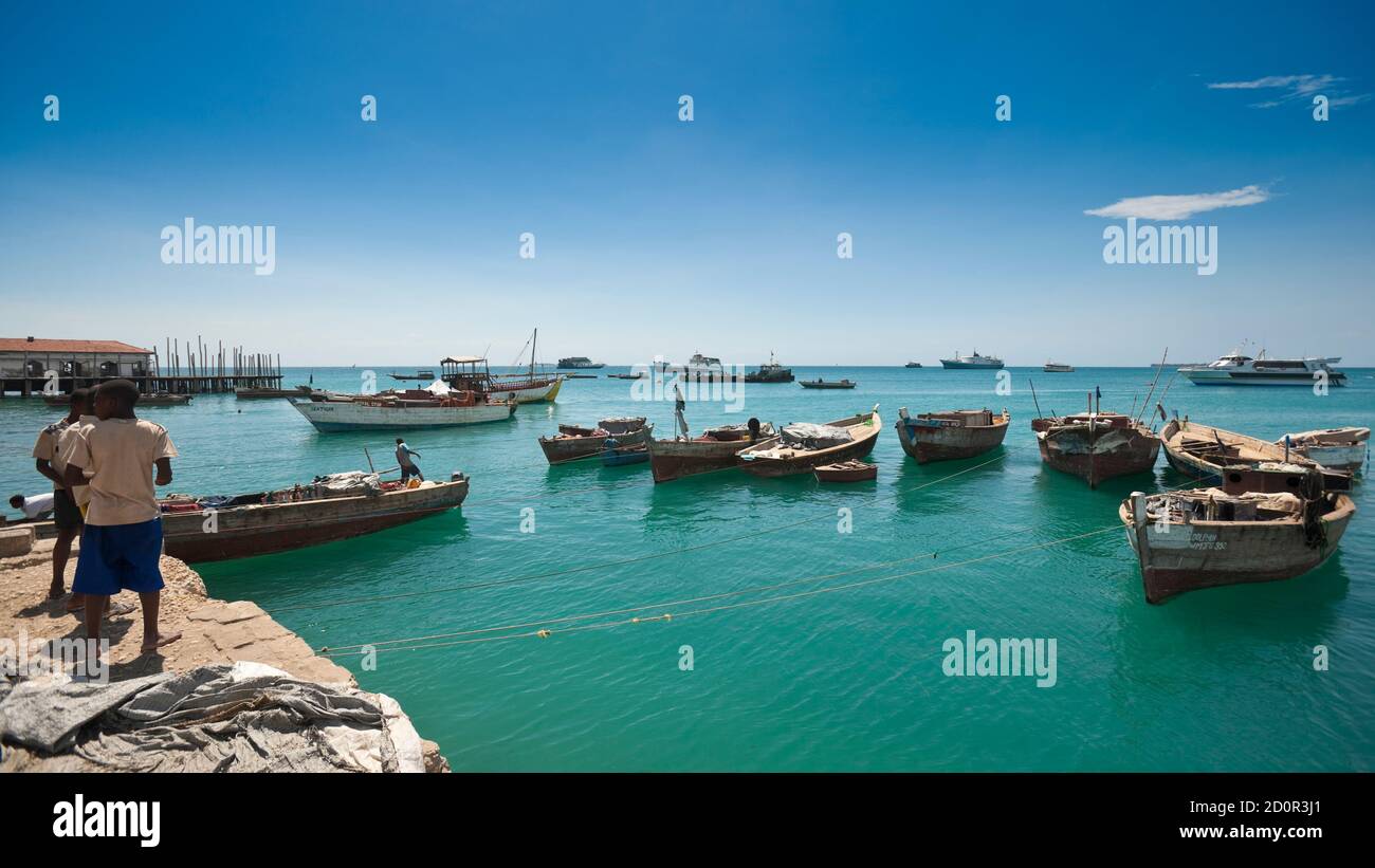 Stone Town, Zanzibar, Tanzania | October 21, 2007: Boats and people in ...