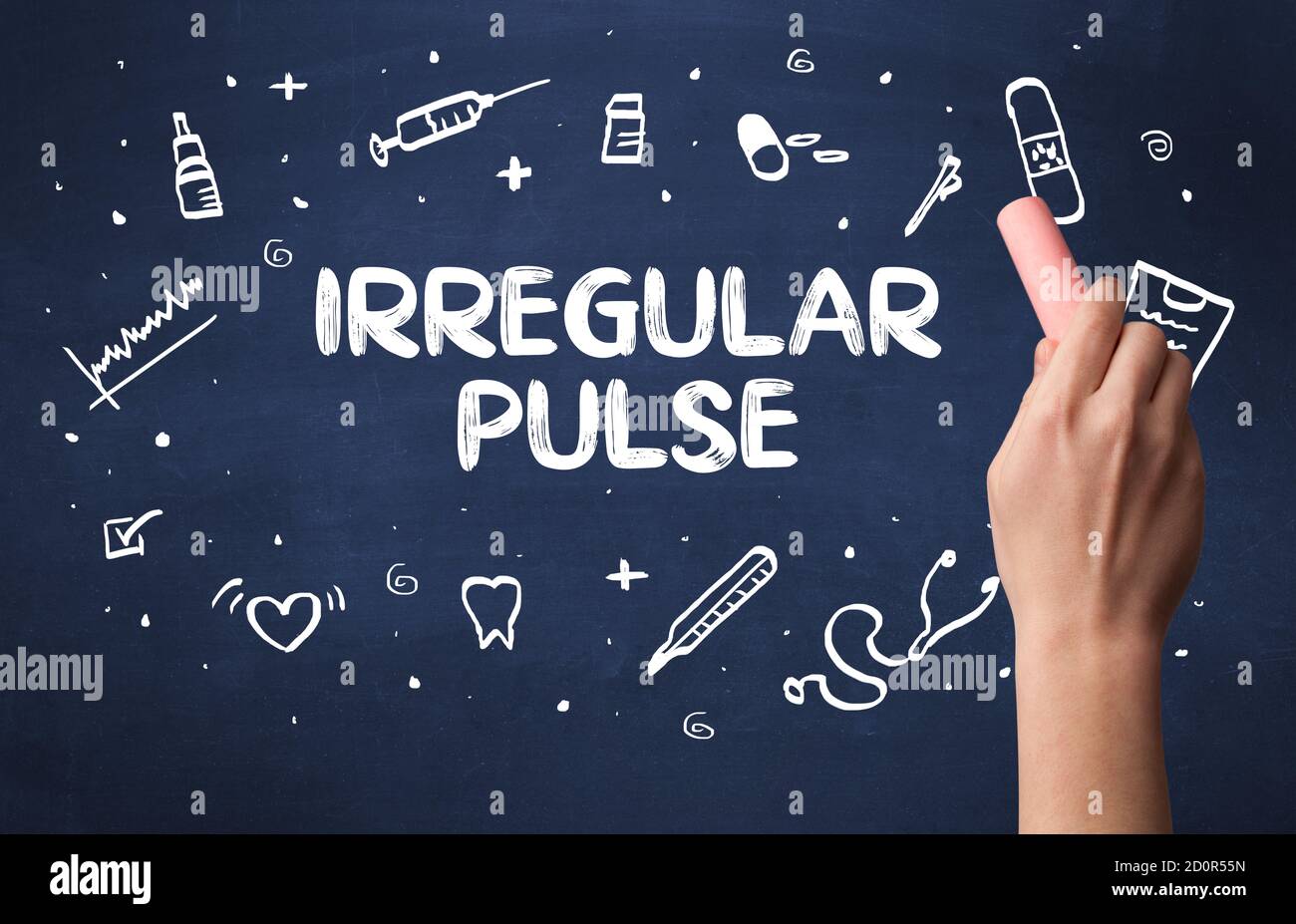 Hand drawing IRREGULAR PULSE inscription with white chalk on blackboard ...