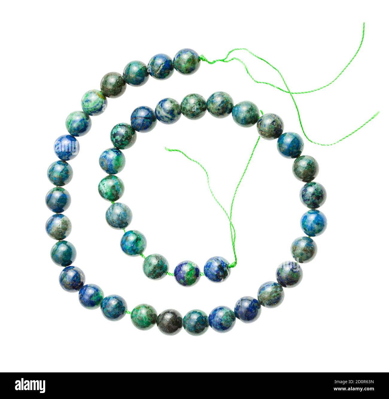 coiled string from polished azurite with malachite balls isolated on ...
