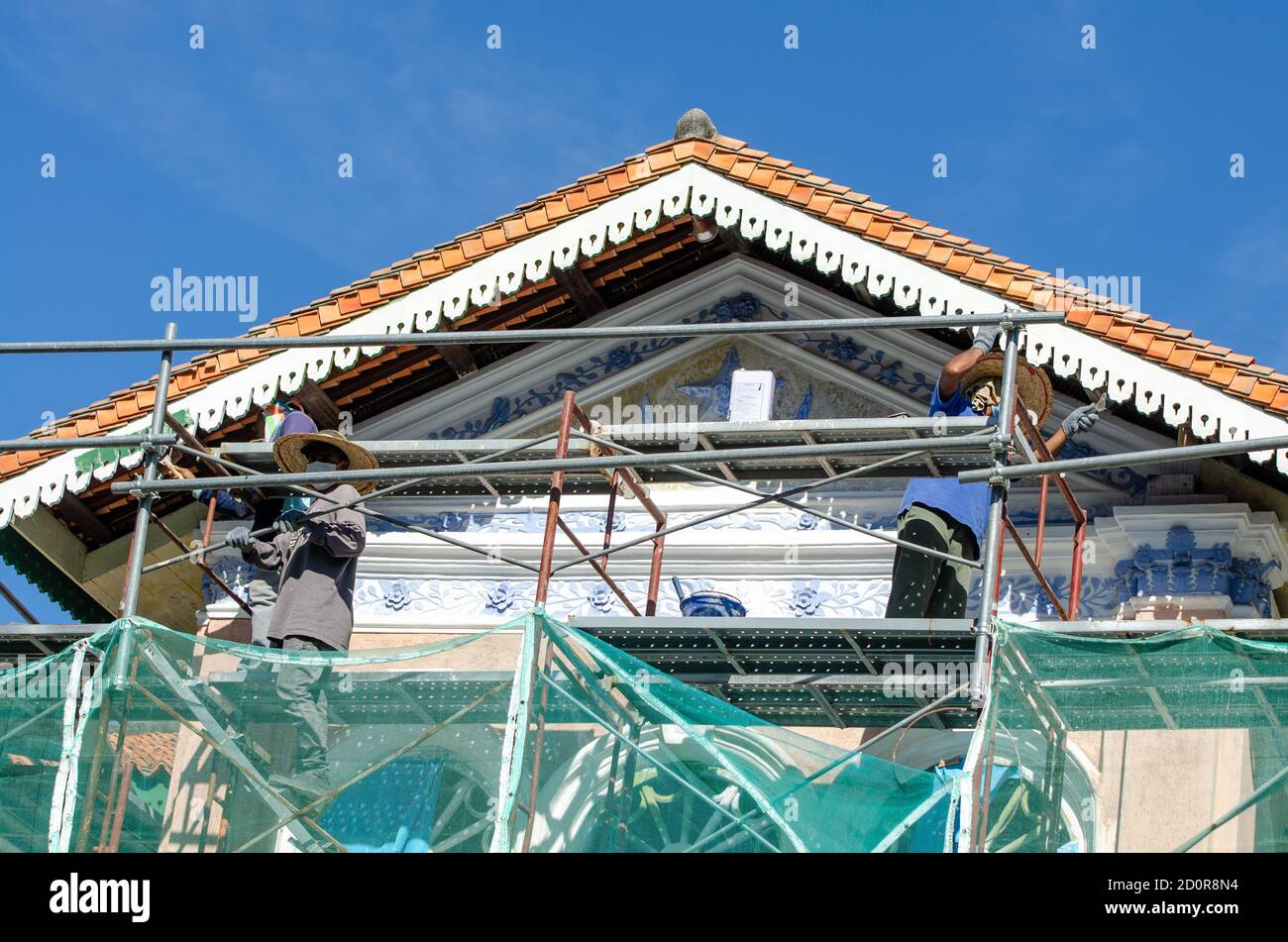 Georgetown, Penang/Malaysia - Jan 03 2020: Worker renovate heritage ...