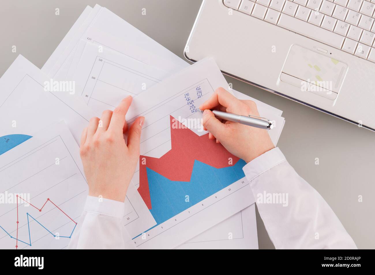 Female hand writing on business documents Stock Photo - Alamy