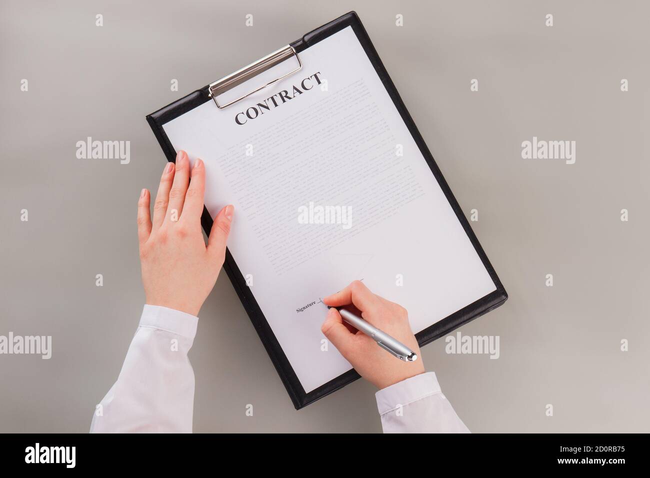 Female hand contract document pen hi-res stock photography and images ...