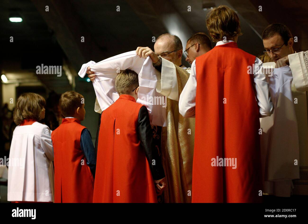 Catholic priest altar boys hi-res stock photography and images - Alamy
