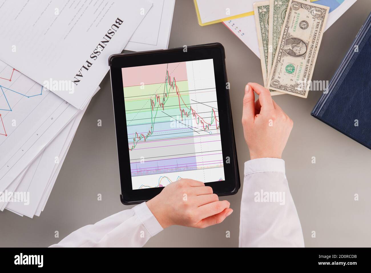 Trader woman working on project Stock Photo - Alamy