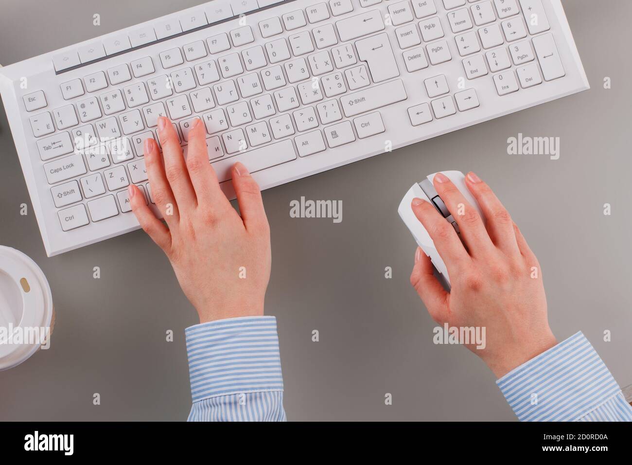 Close up female office manager working on keyboard Stock Photo - Alamy