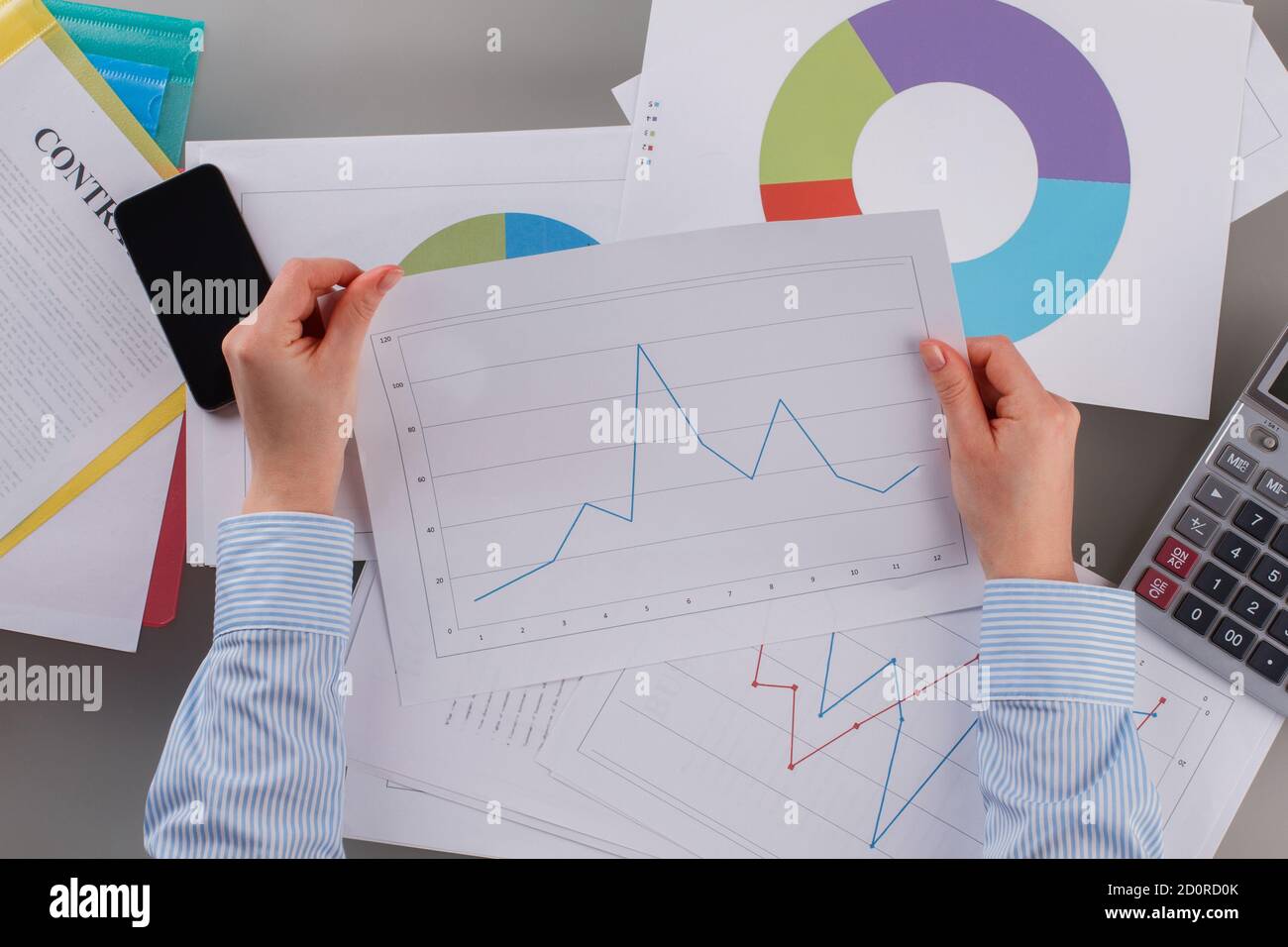 Reviewing charts hi-res stock photography and images - Alamy