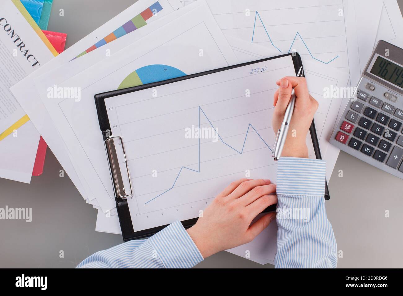 Business woman analyzing statistics graphs data Stock Photo - Alamy Business woman analyzing statistics graphs data Stock Photo - Alamy