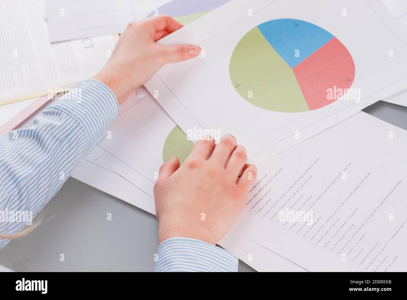 Human hands holding business documents Stock Photo - Alamy