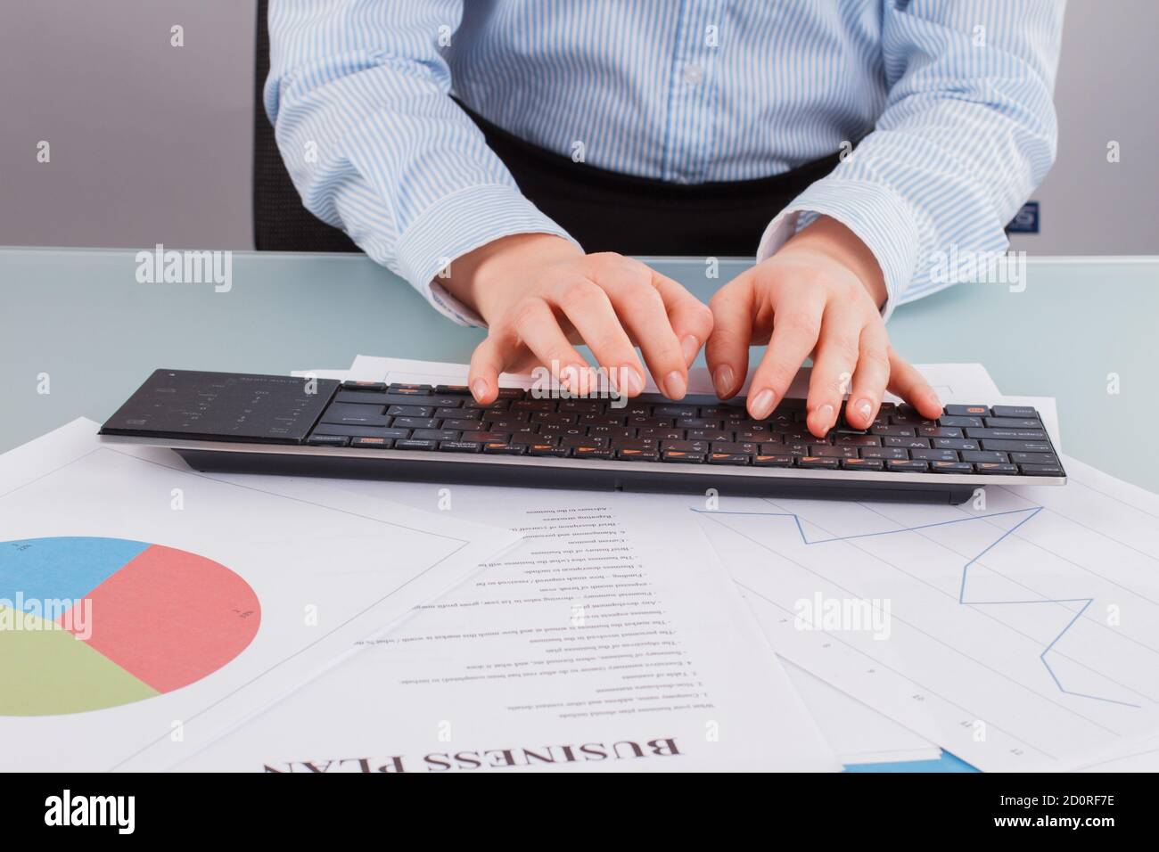 Hands of business woman typing on computer keyboard Stock Photo - Alamy
