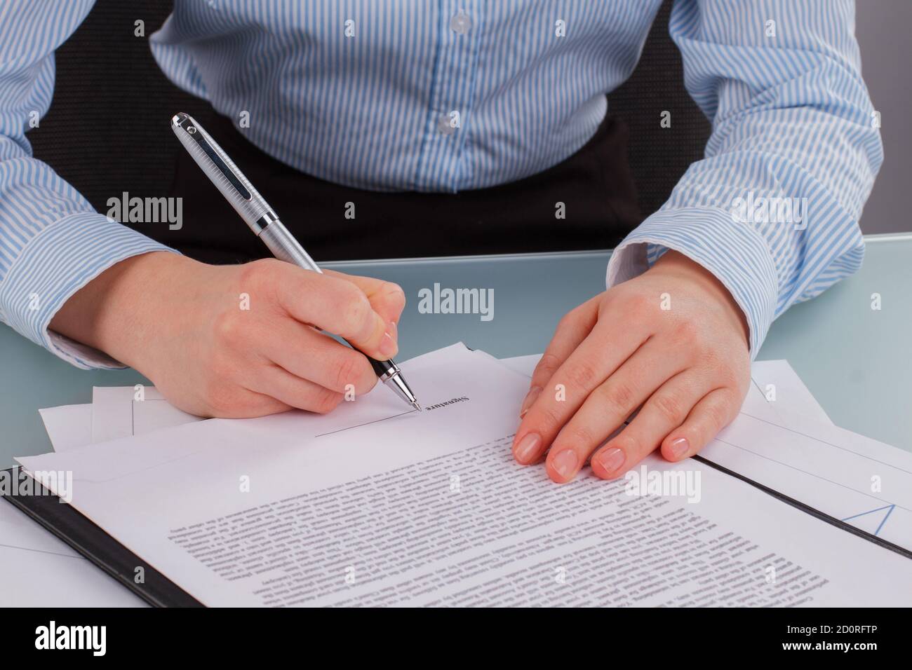 Lady signing hi-res stock photography and images - Alamy