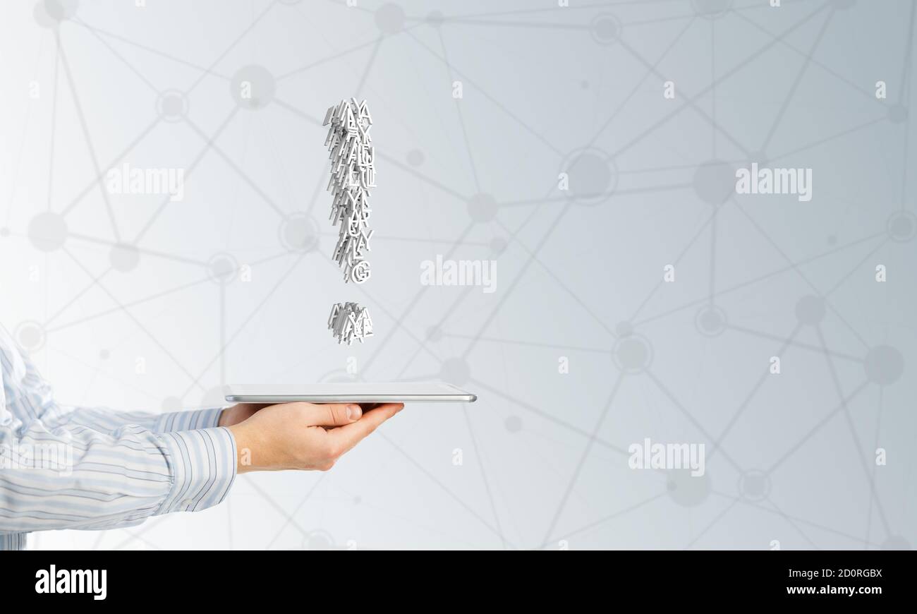 Exclamation mark and tablet Stock Photo - Alamy