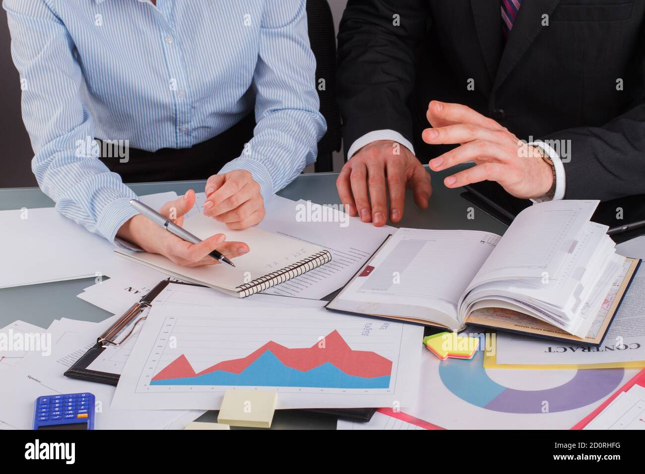 Discussing financial charts hi-res stock photography and images - Alamy