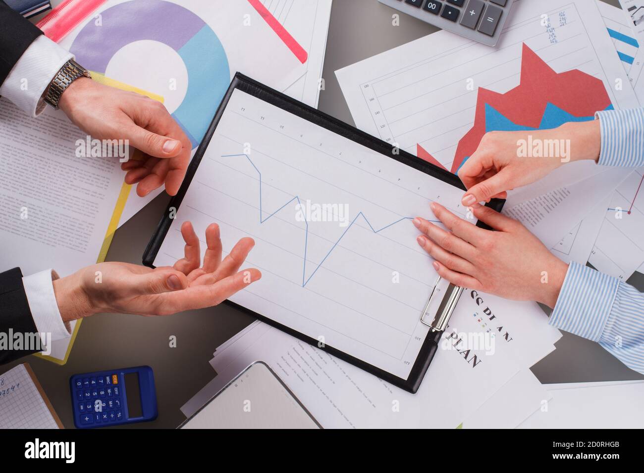 Discussing financial charts hi-res stock photography and images - Alamy
