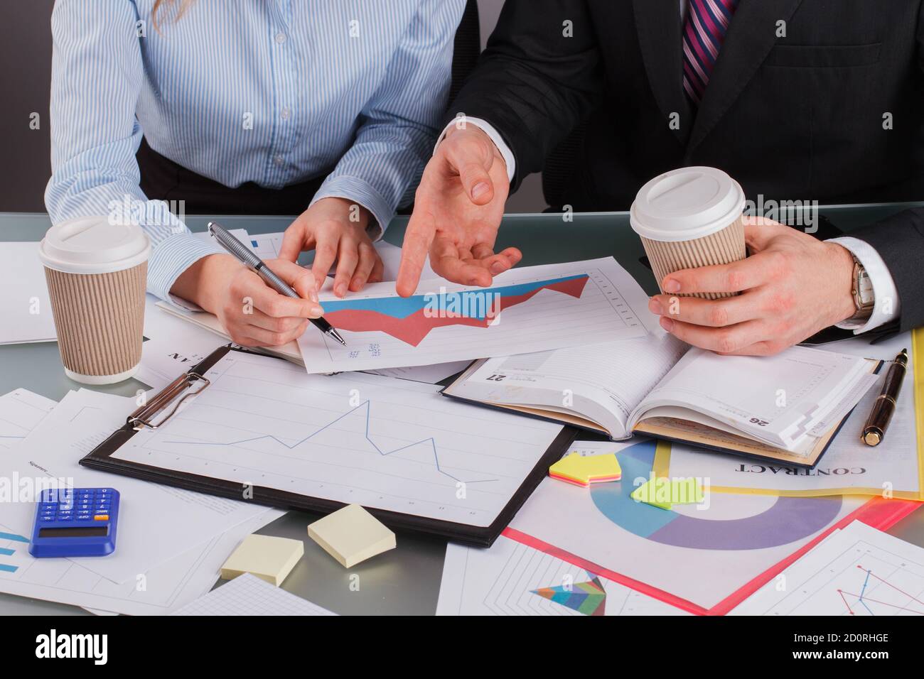 Business people analyzing graphic hi-res stock photography and images ...