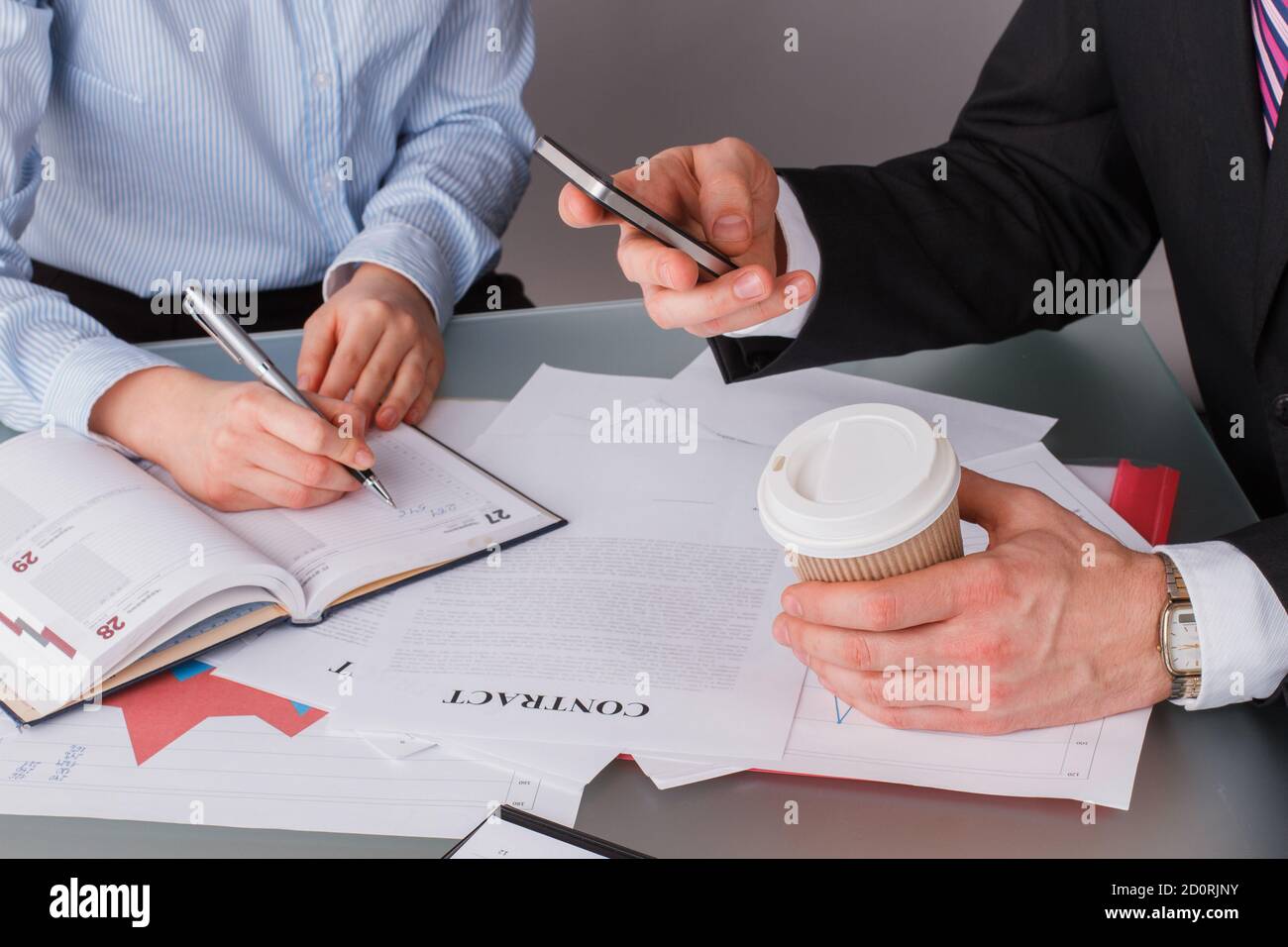 Business team doing paperwork working hi-res stock photography and ...