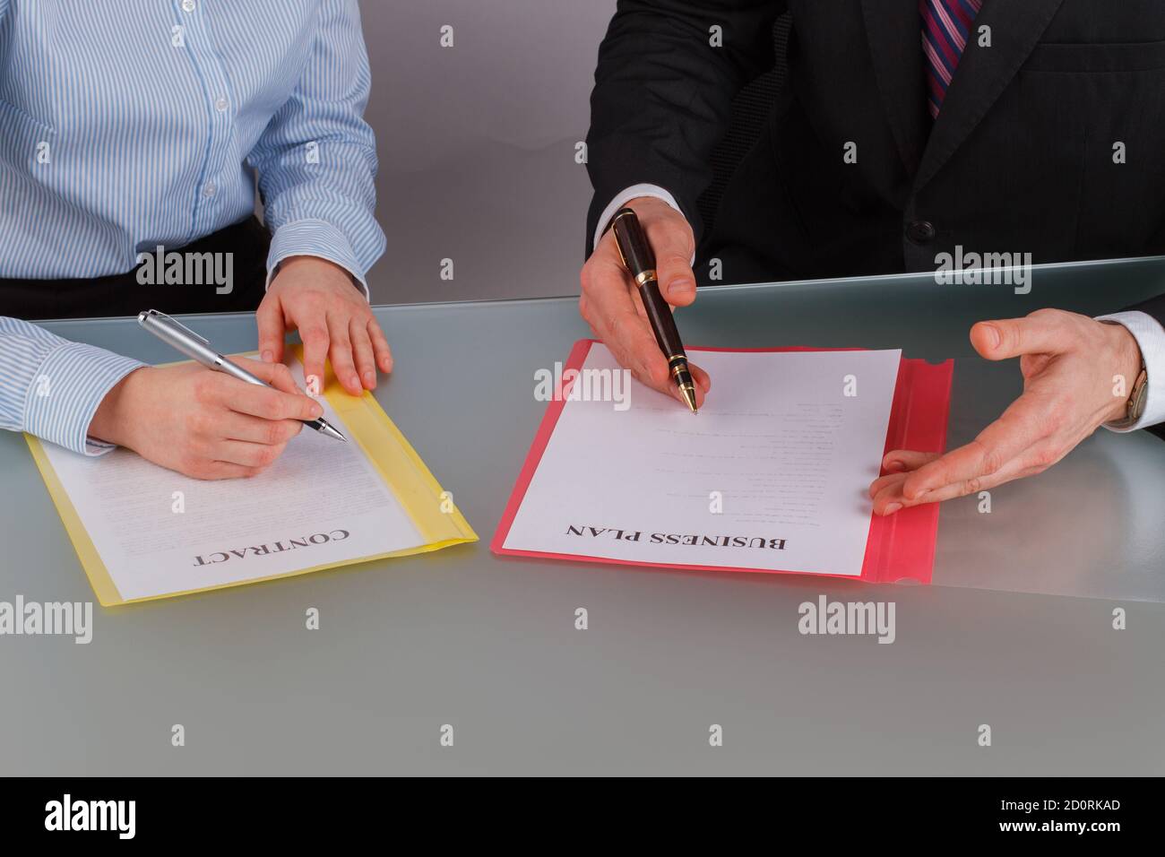 Business people discussing documents contract hi-res stock photography ...