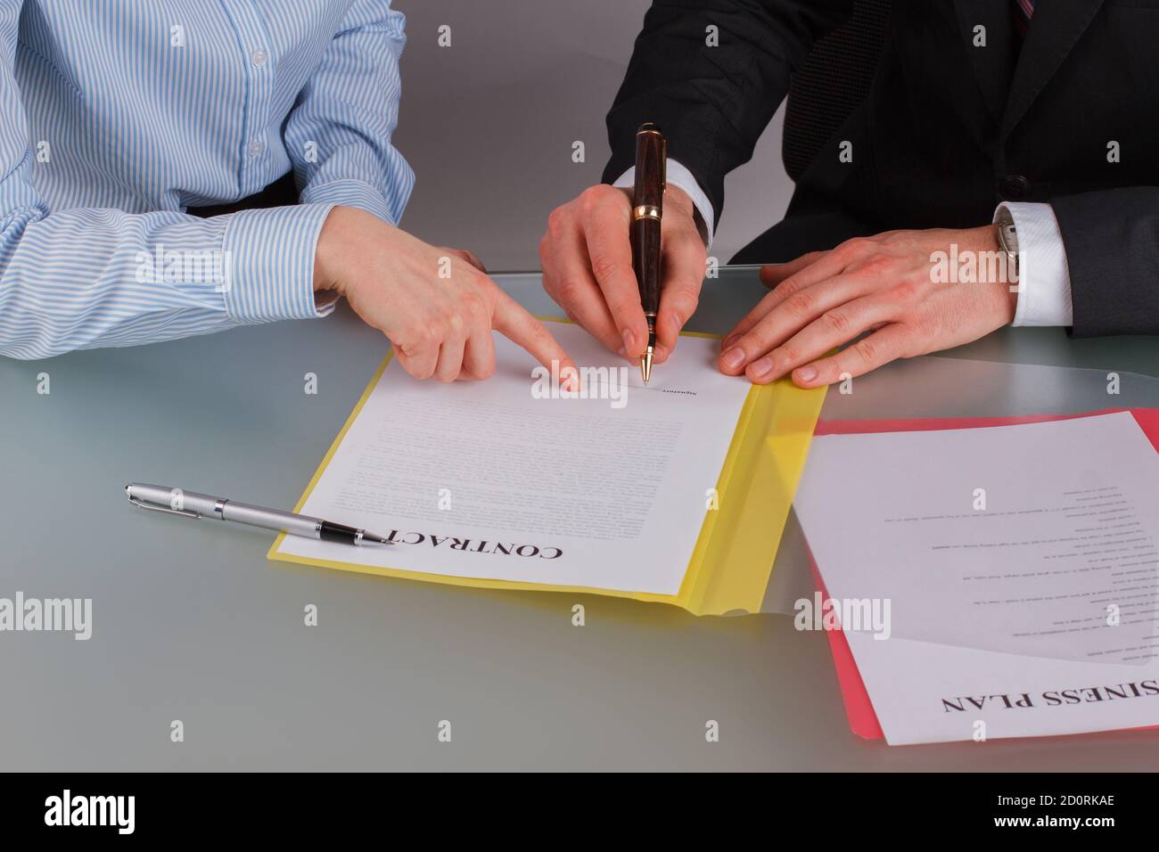 Businessman signing contract partner hi-res stock photography and ...