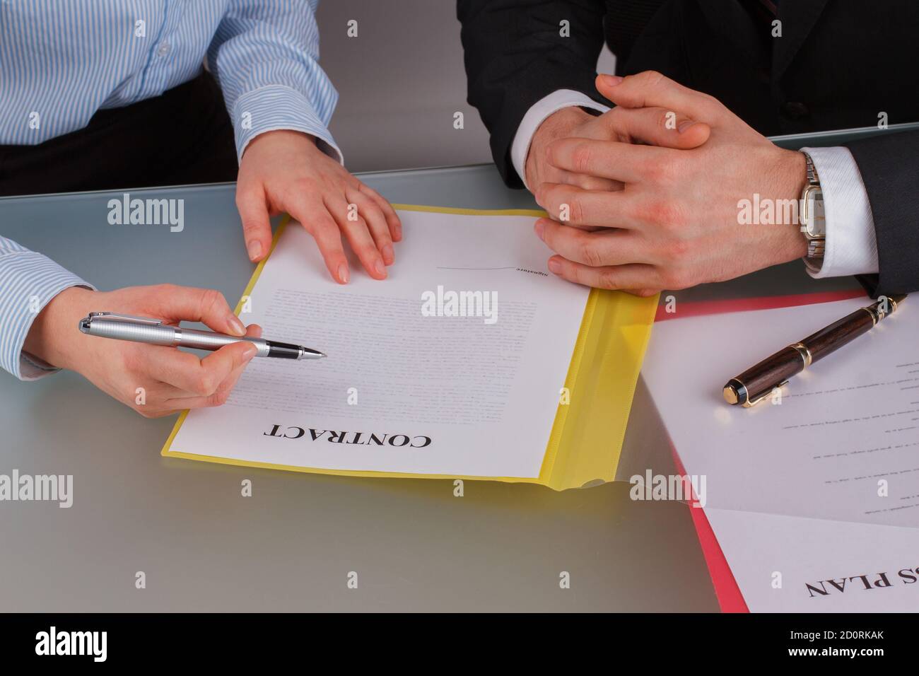Businessman discussing contract male colleague hi-res stock photography ...