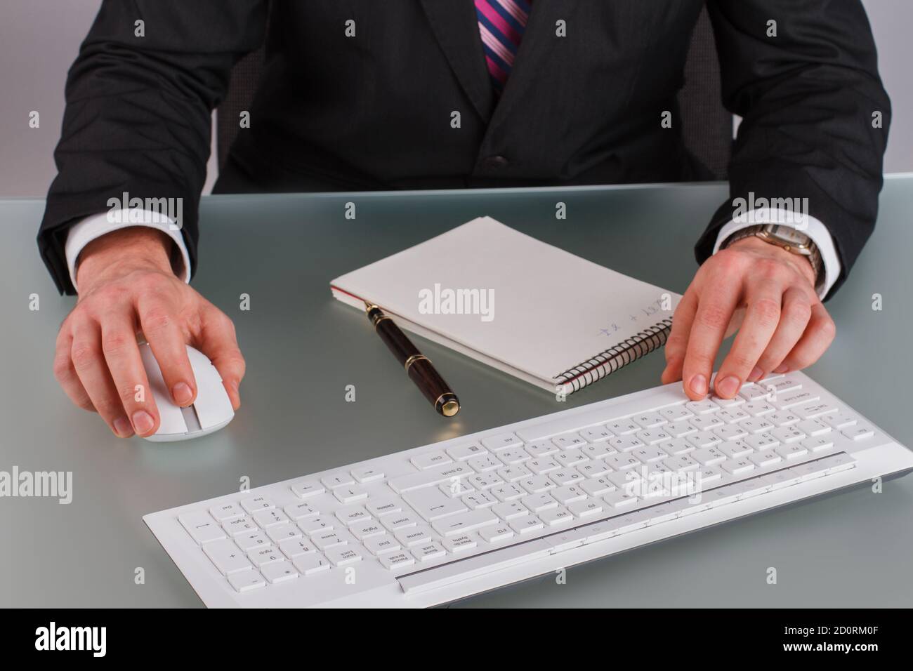 Close up of businessman hands working on computer at office Stock Photo ...
