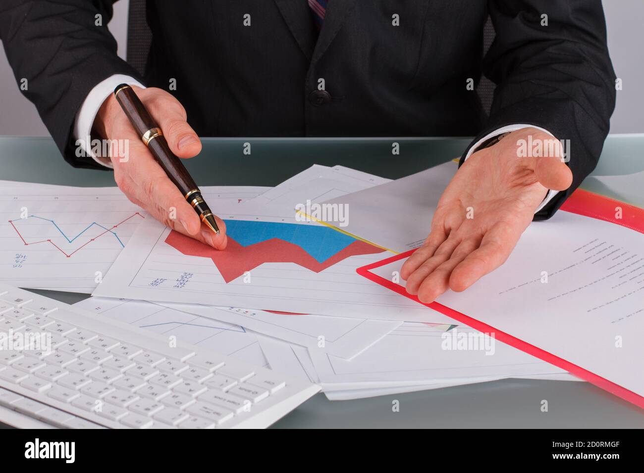 Businessman analyzing charts graphs laptop hi-res stock photography and images - Alamy