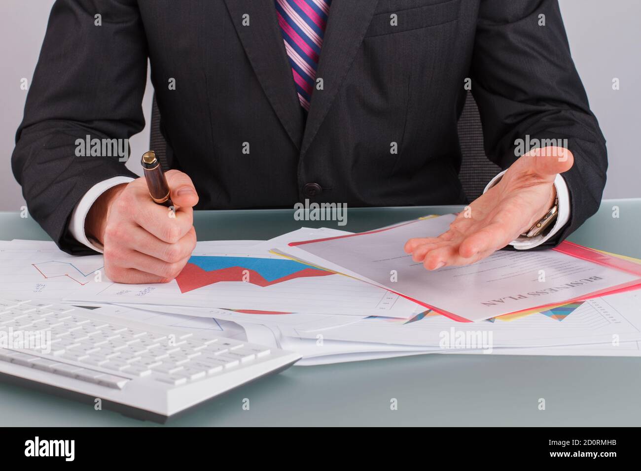 Close up businessman analyzes hi-res stock photography and images - Alamy