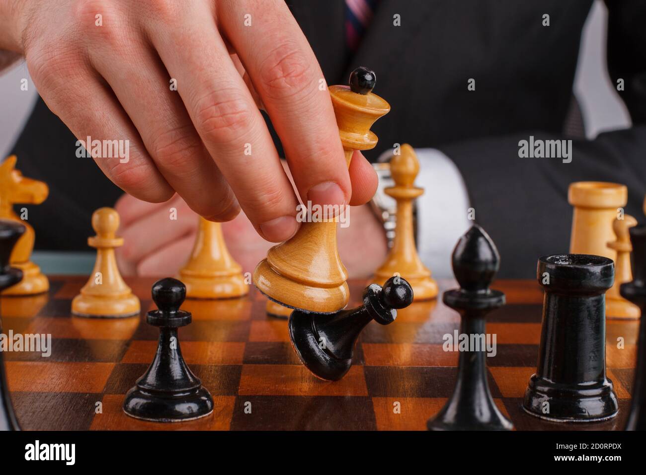Hand playing chess hi-res stock photography and images - Alamy