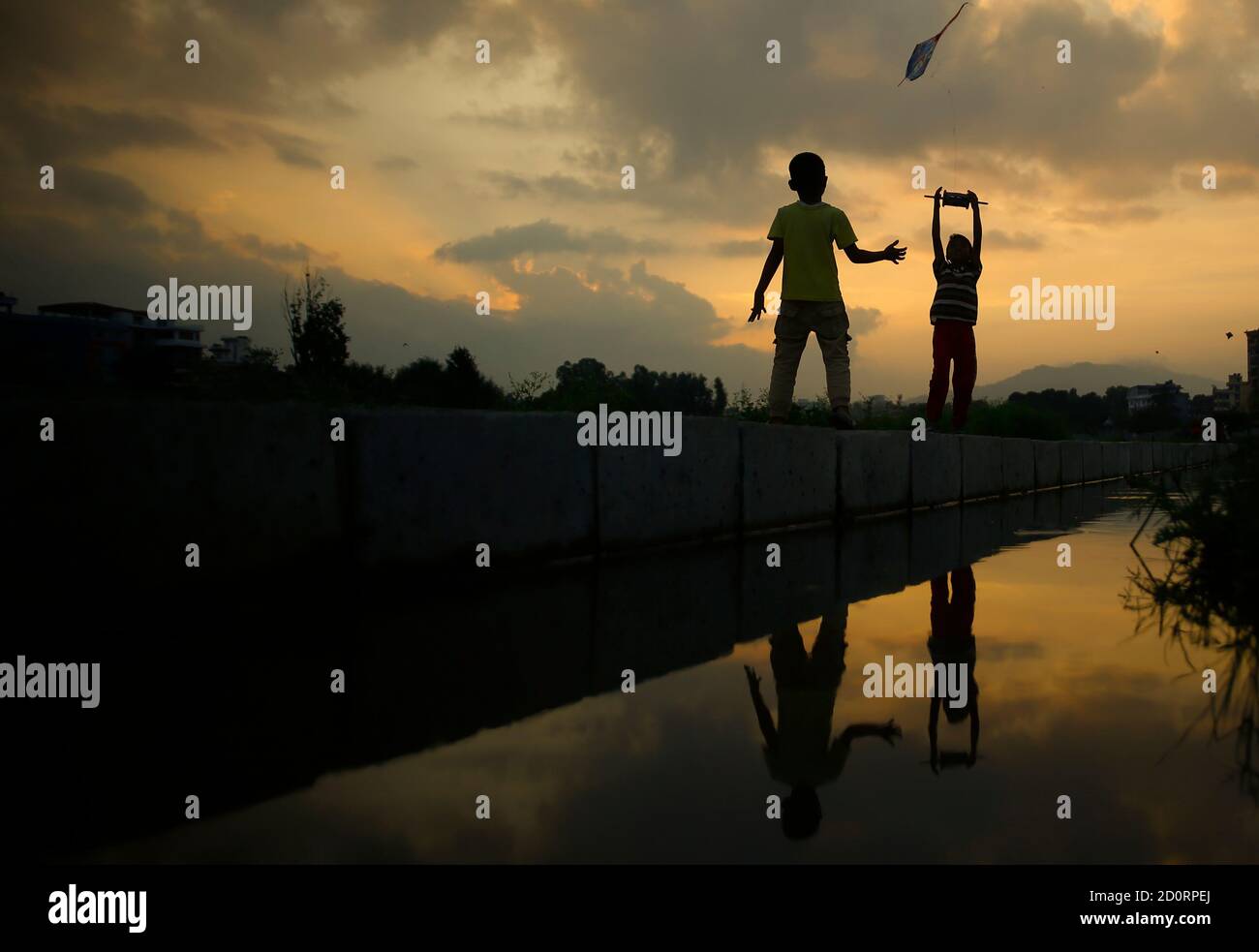 Kathmandu, Nepal. 3rd Oct, 2020. A group of Nepalese boys fly kites ...