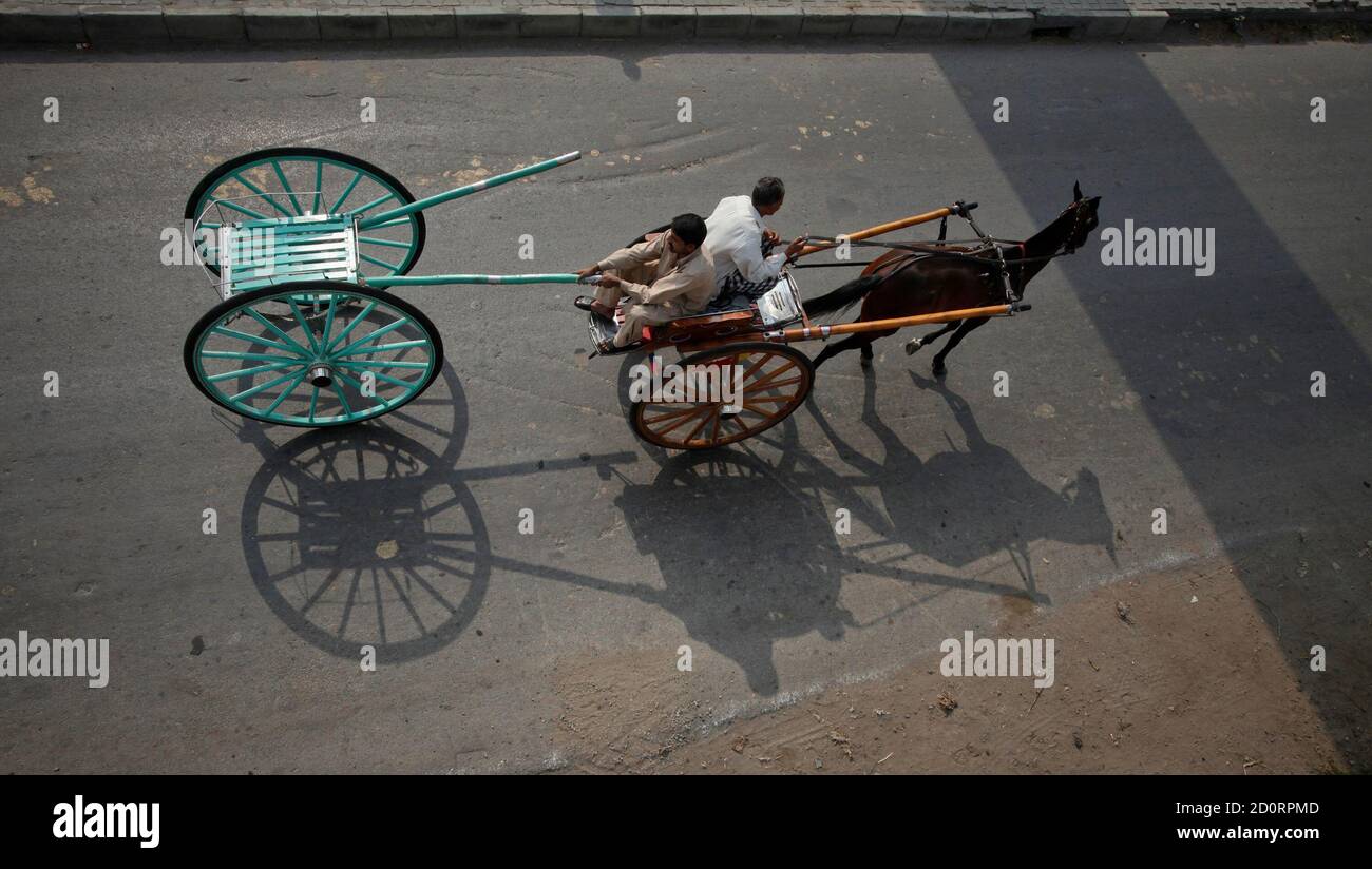 Street man pulls cart hi-res stock photography and images - Alamy