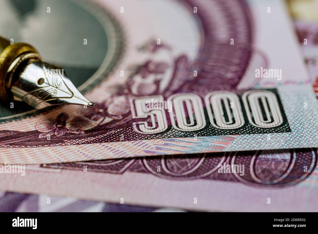 Banknote of North Korea won is the national currency bill and pen for ...