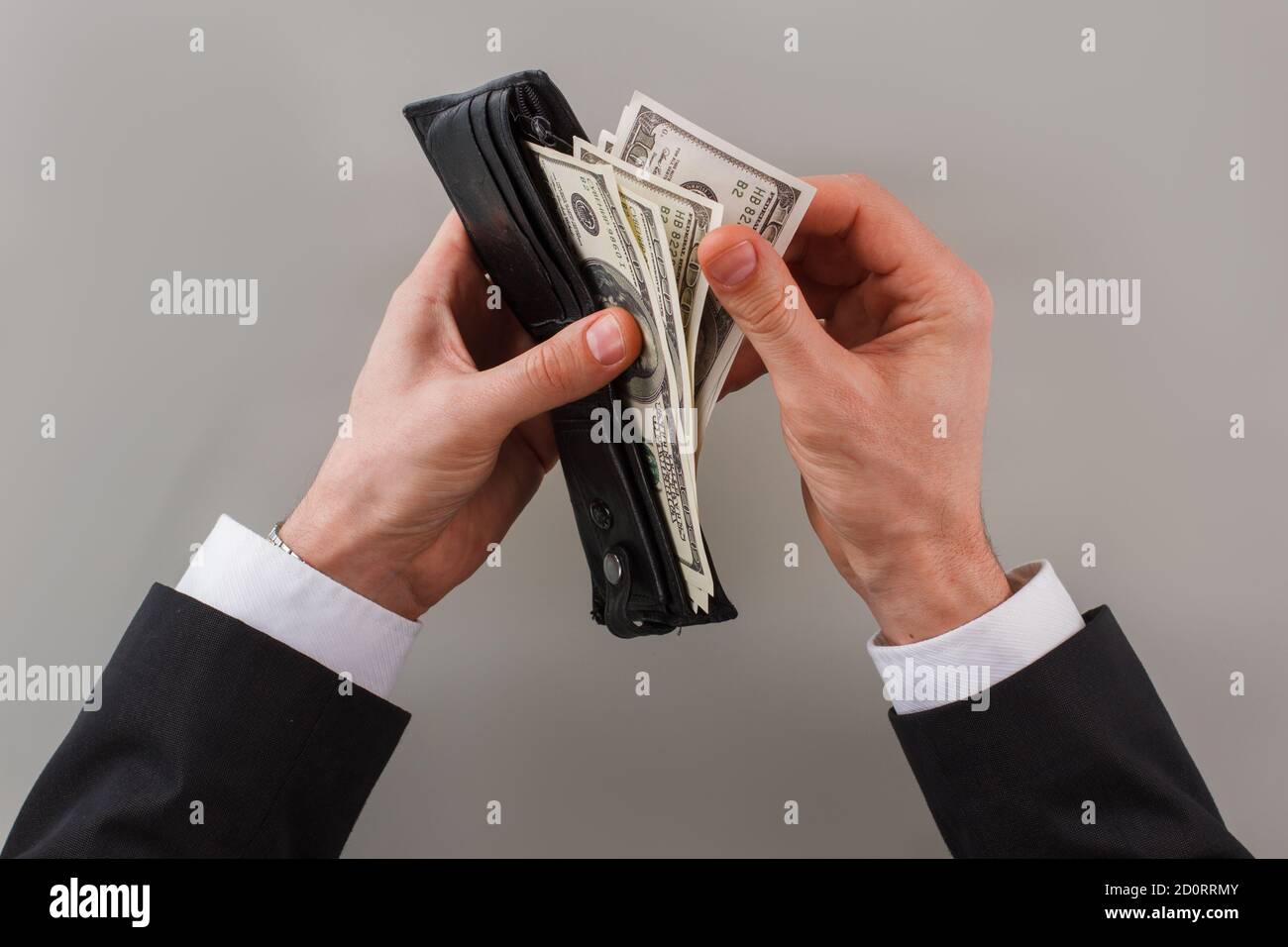 Taking money out wallet hi-res stock photography and images - Alamy