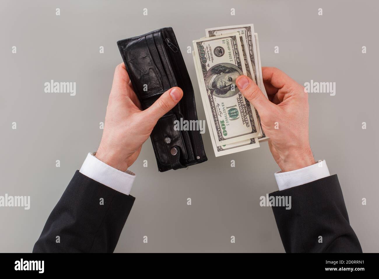 Money out of wallet hi-res stock photography and images - Alamy
