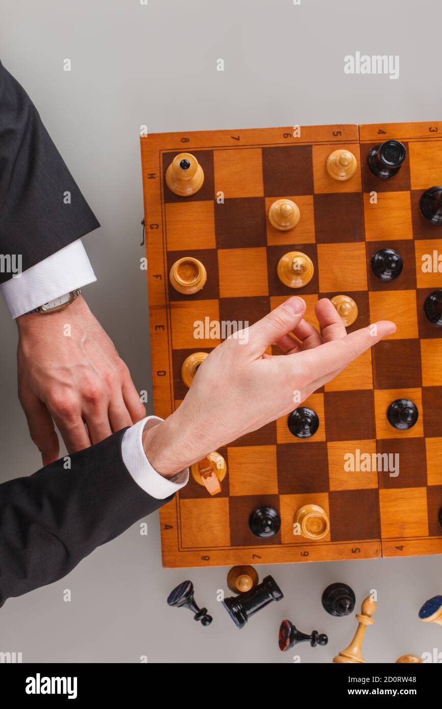Hand playing chess hi-res stock photography and images - Alamy