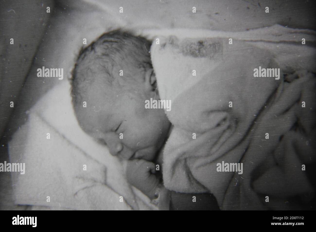 Fine 1970s vintage black and white photography of a newborn baby laying ...
