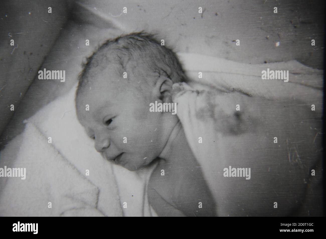 Fine 1970s vintage black and white photography of a newborn baby laying ...