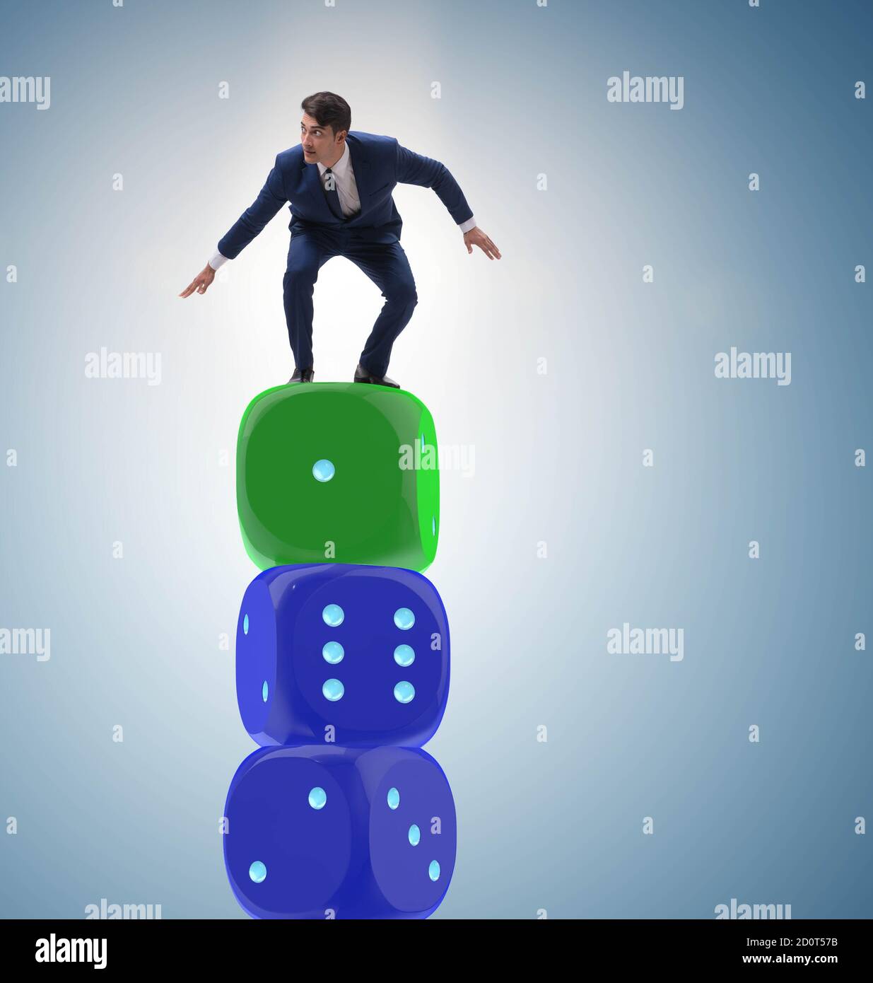 Businessman balancing on top of dice stack in uncertainty concept Stock ...