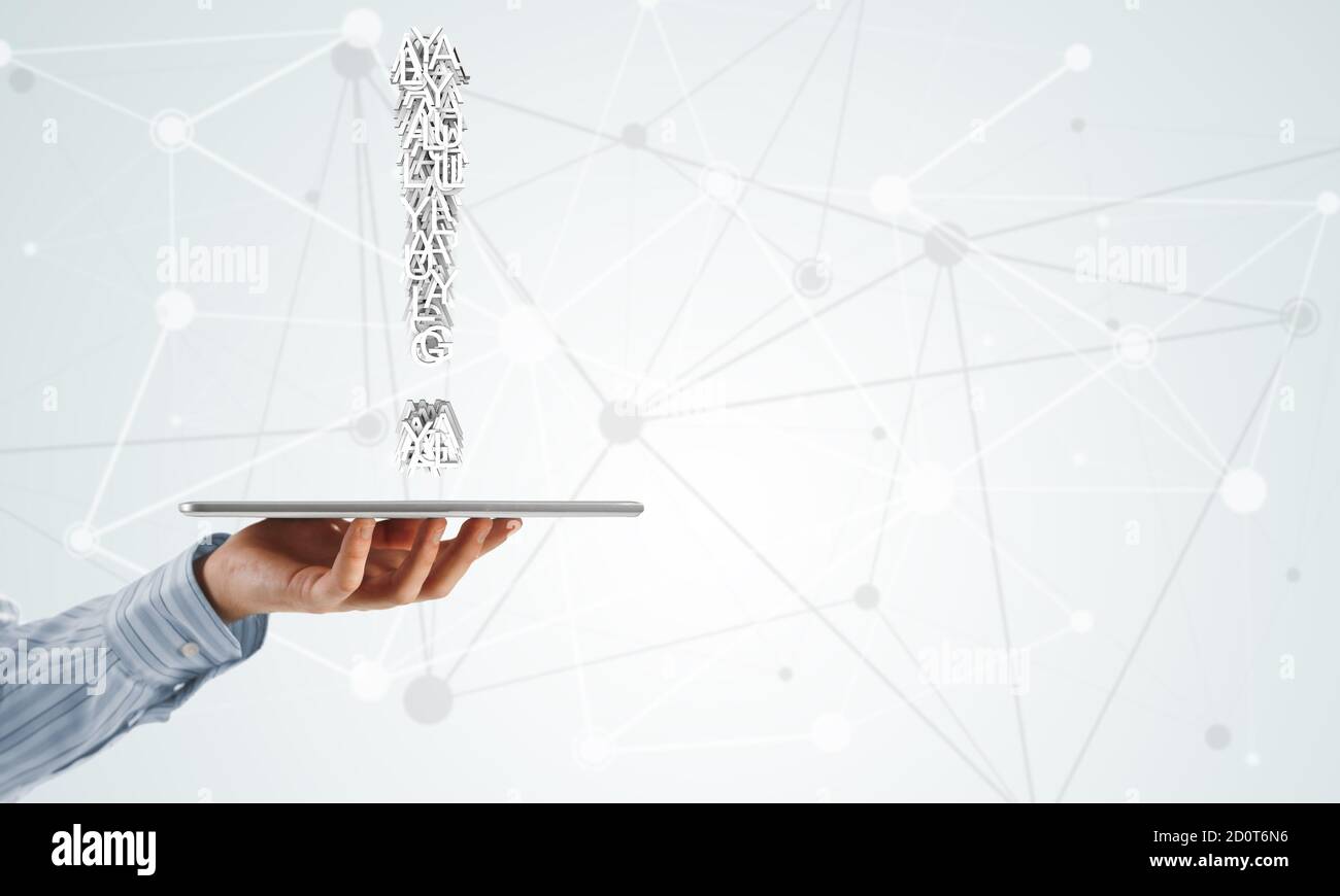 Exclamation mark and tablet Stock Photo - Alamy