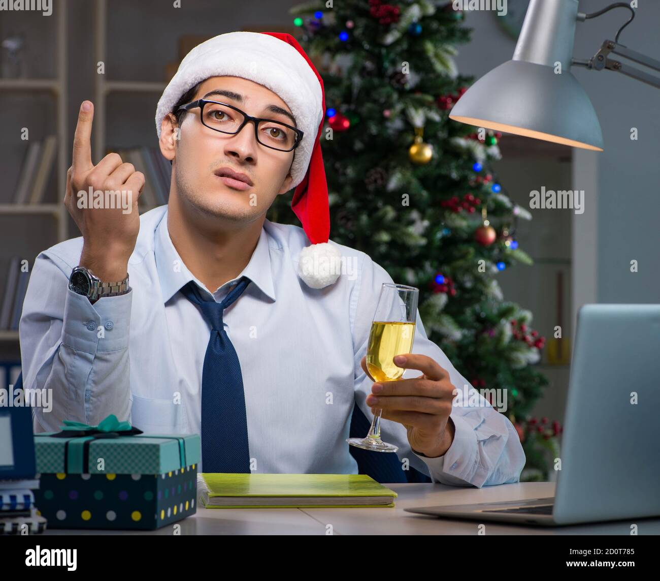 The businessman working late on christmas day in office Stock Photo - Alamy