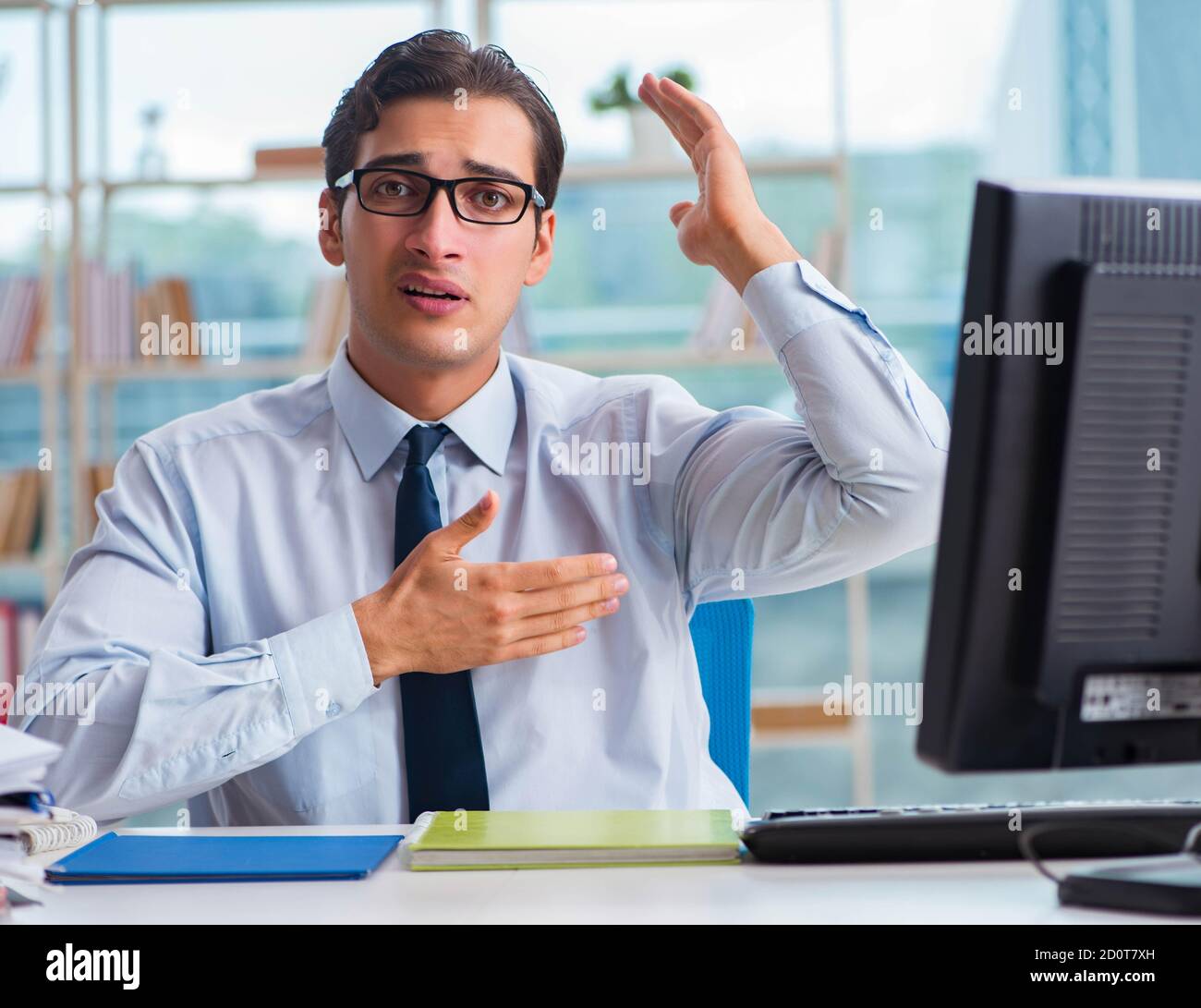 The businessman suffering from excessive armpit sweating Stock Photo ...