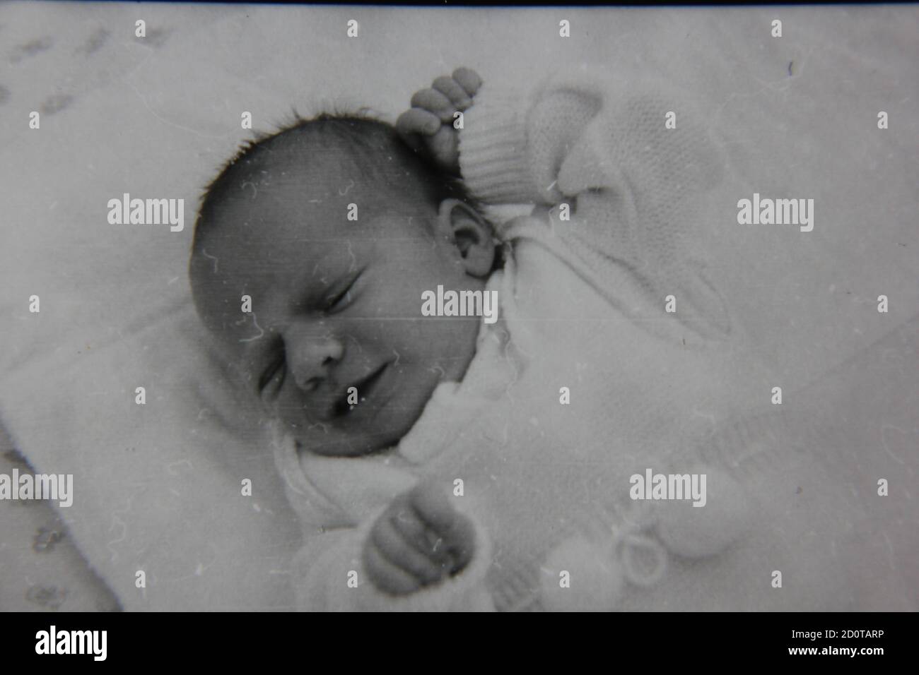 Fine 1970s vintage black and white photography of a newborn baby laying ...