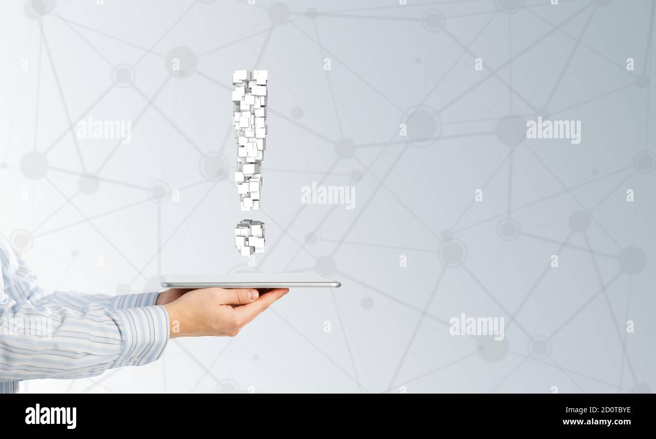 Exclamation mark and tablet Stock Photo - Alamy
