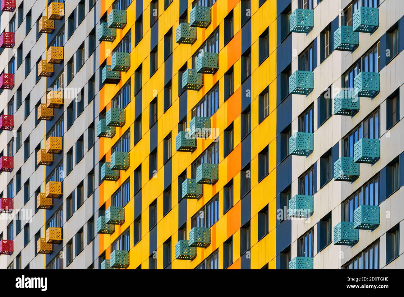 Colorful pattern from windows and balconies in modern residential ...