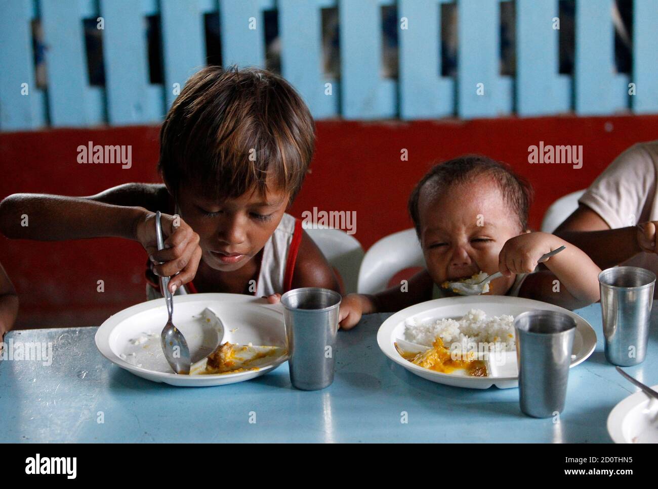 Philippines feeding program hi-res stock photography and images - Alamy
