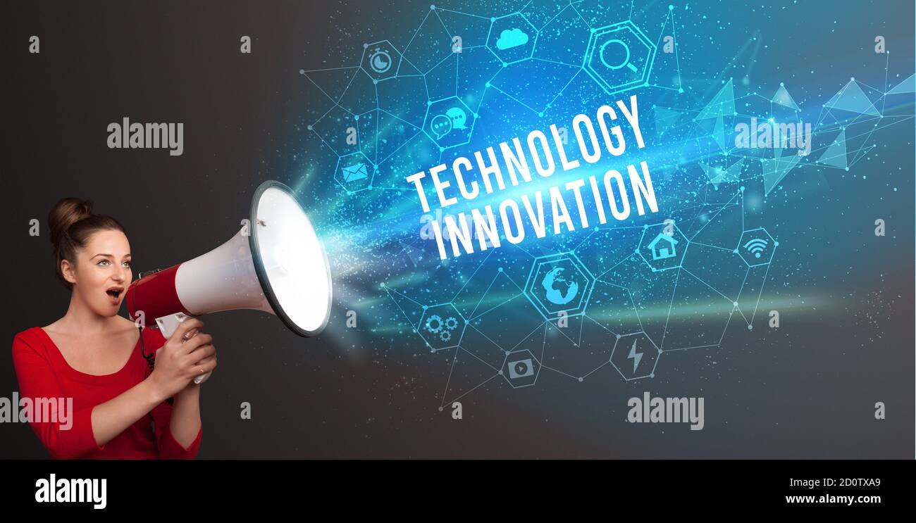 Young woman shouting in megaphone with TECHNOLOGY INNOVATION ...