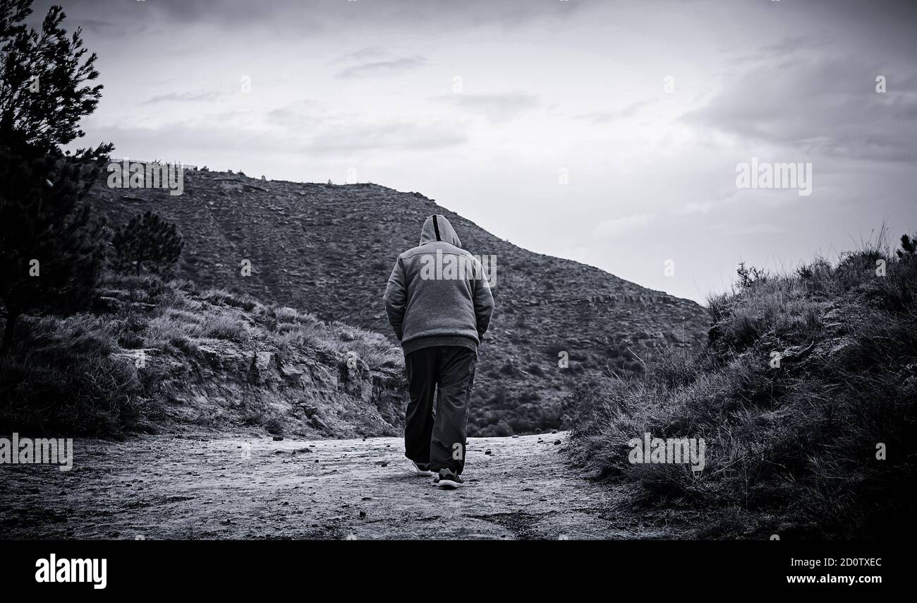 Man walking countryside back view hi-res stock photography and images ...