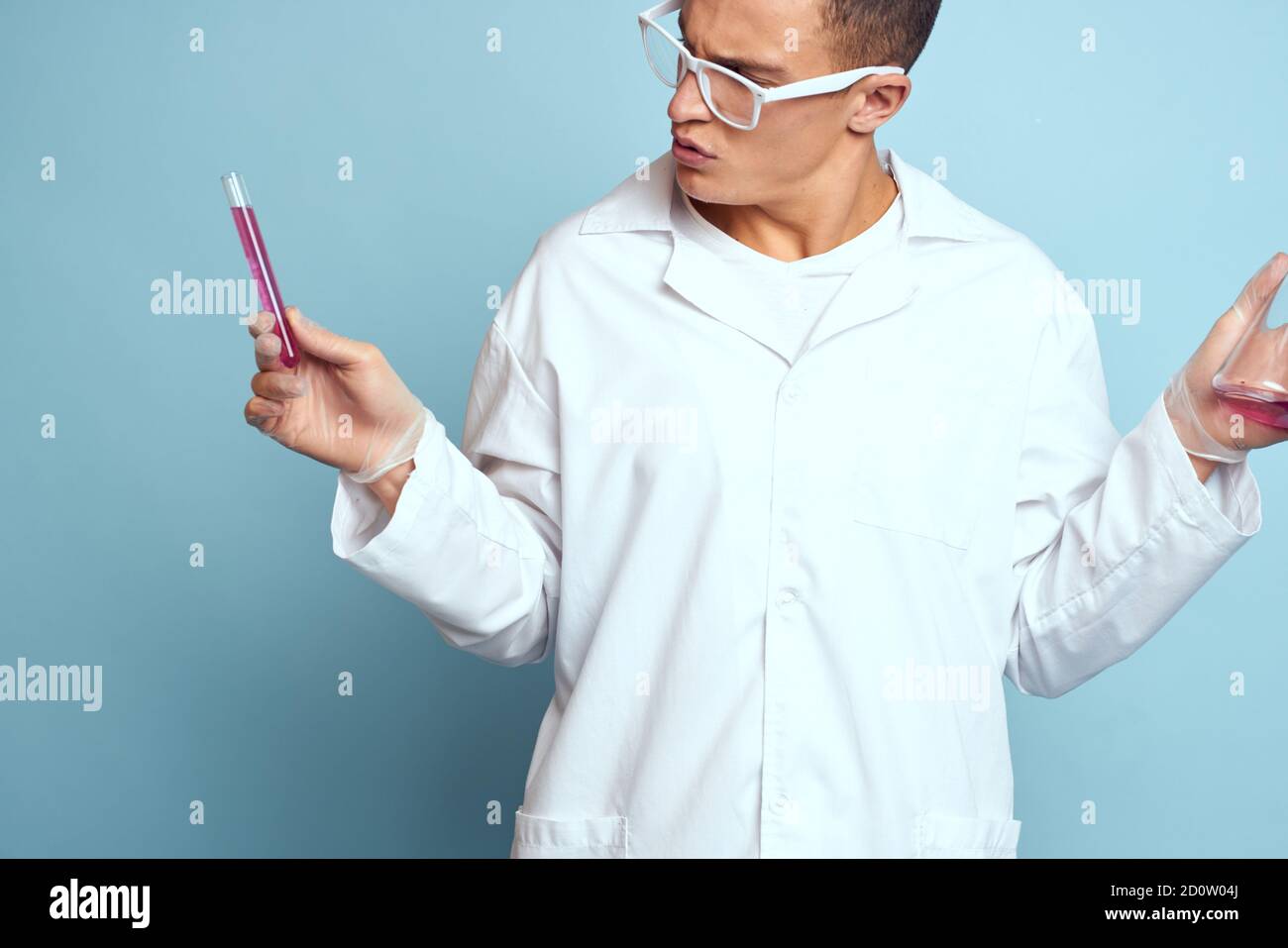 man holding flasks colorful liquid chemical laboratory model wearing ...